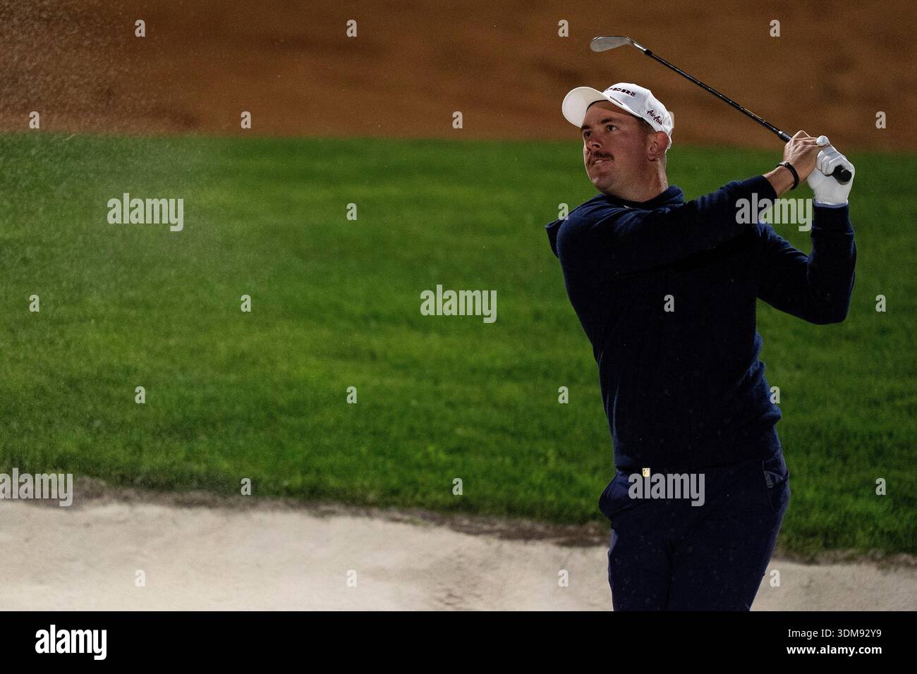 Lucas Herbert of Ripper GC hits his shot from the bunker on the 6th ...