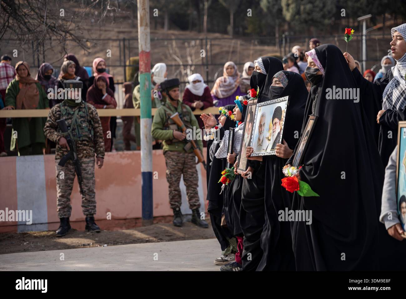 Kashmiri Shia Muslim girls holding photographs of Iranian leader ...