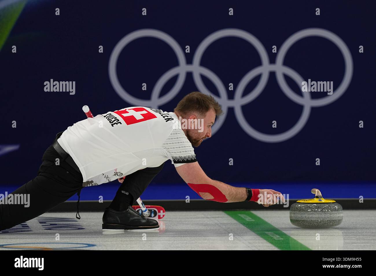 Switzerland's Yannick Schwaller in action, during the mixed doubles ...
