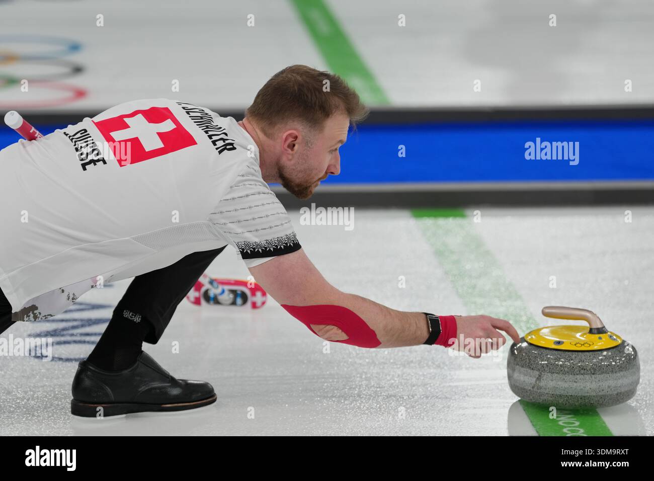 Switzerland's Yannick Schwaller competes during the mixed doubles round ...