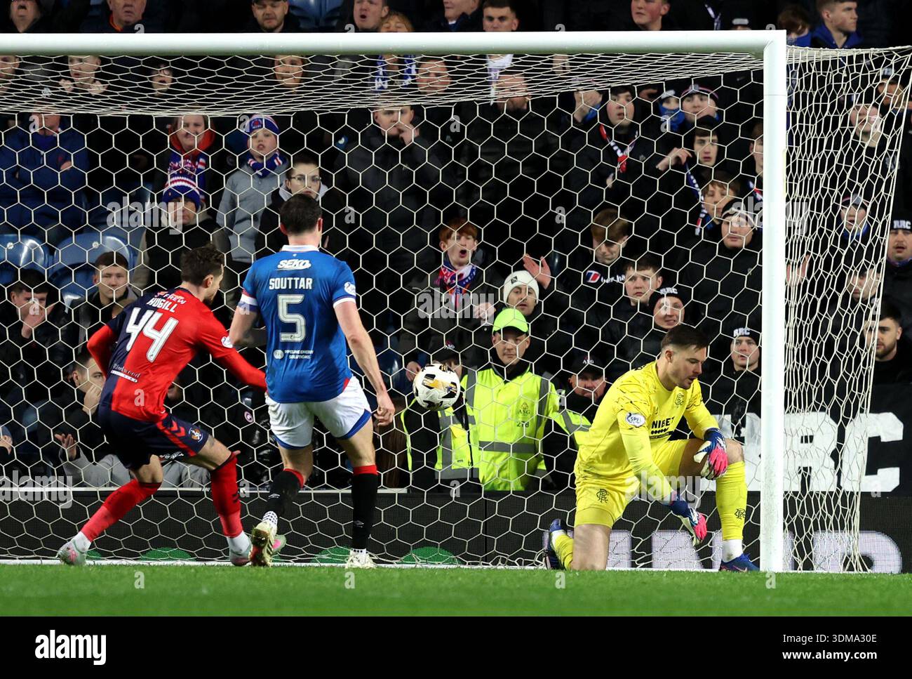 Rangers goalkeeper Jack Butland reacts after conceding their side's ...