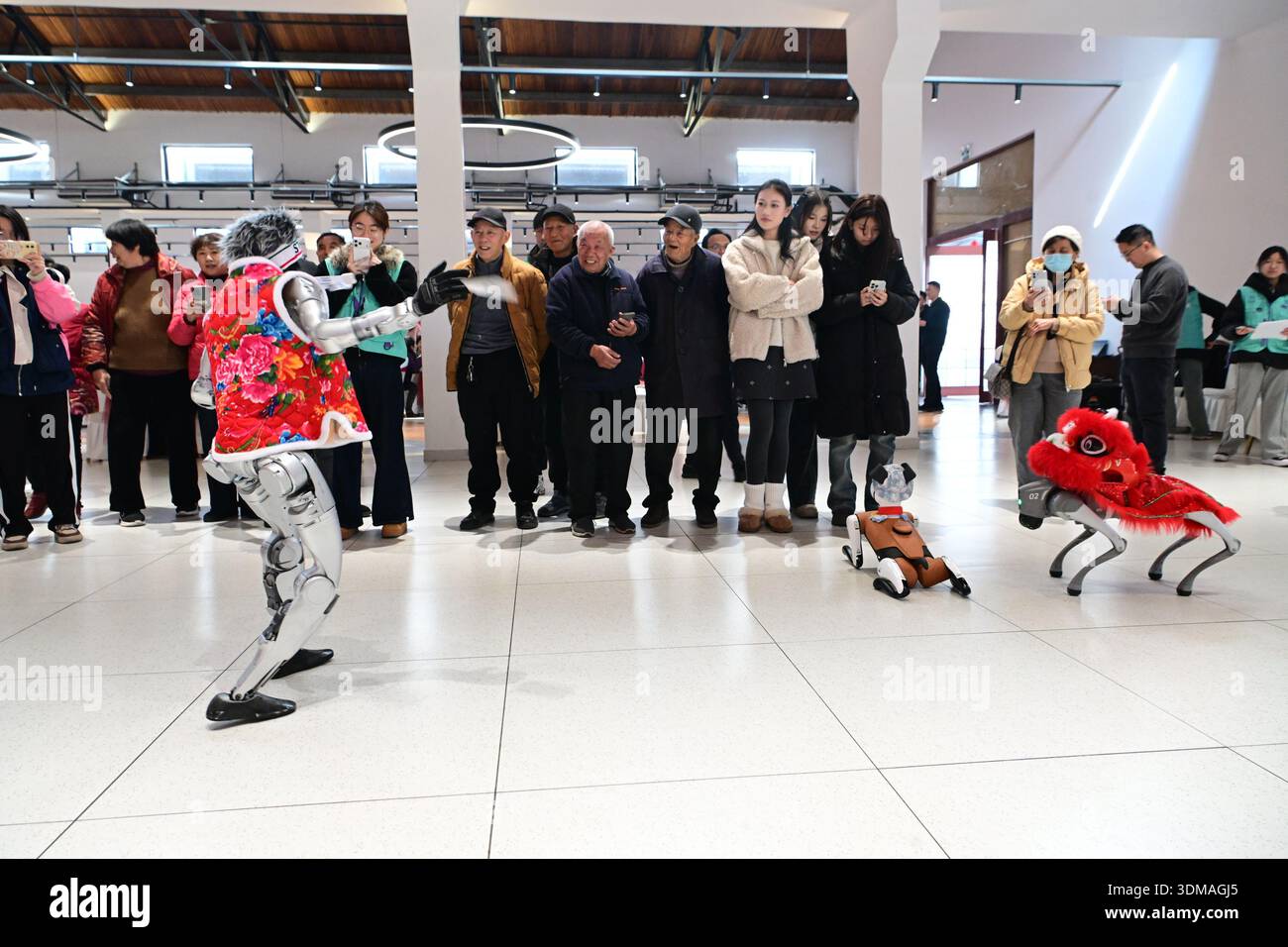 TAICANG, CHINA - FEBRUARY 4, 2026 - The audience watched a robot and ...