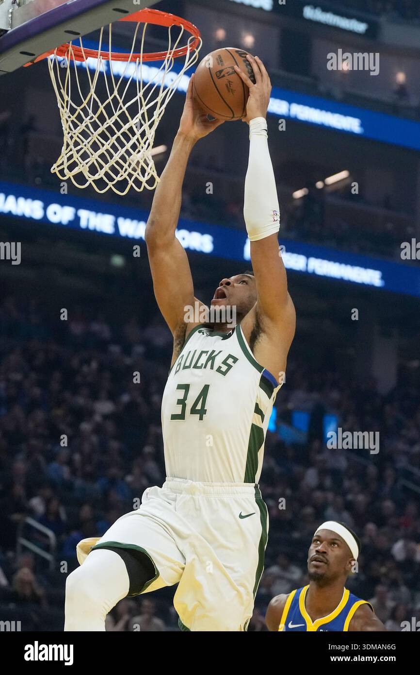 Milwaukee Bucks forward Giannis Antetokounmpo dunks during an NBA ...