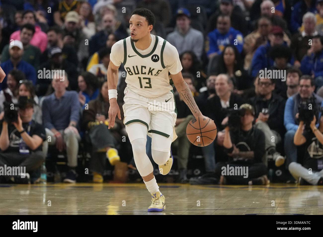 Milwaukee Bucks guard Ryan Rollins (13) during an NBA basketball game ...