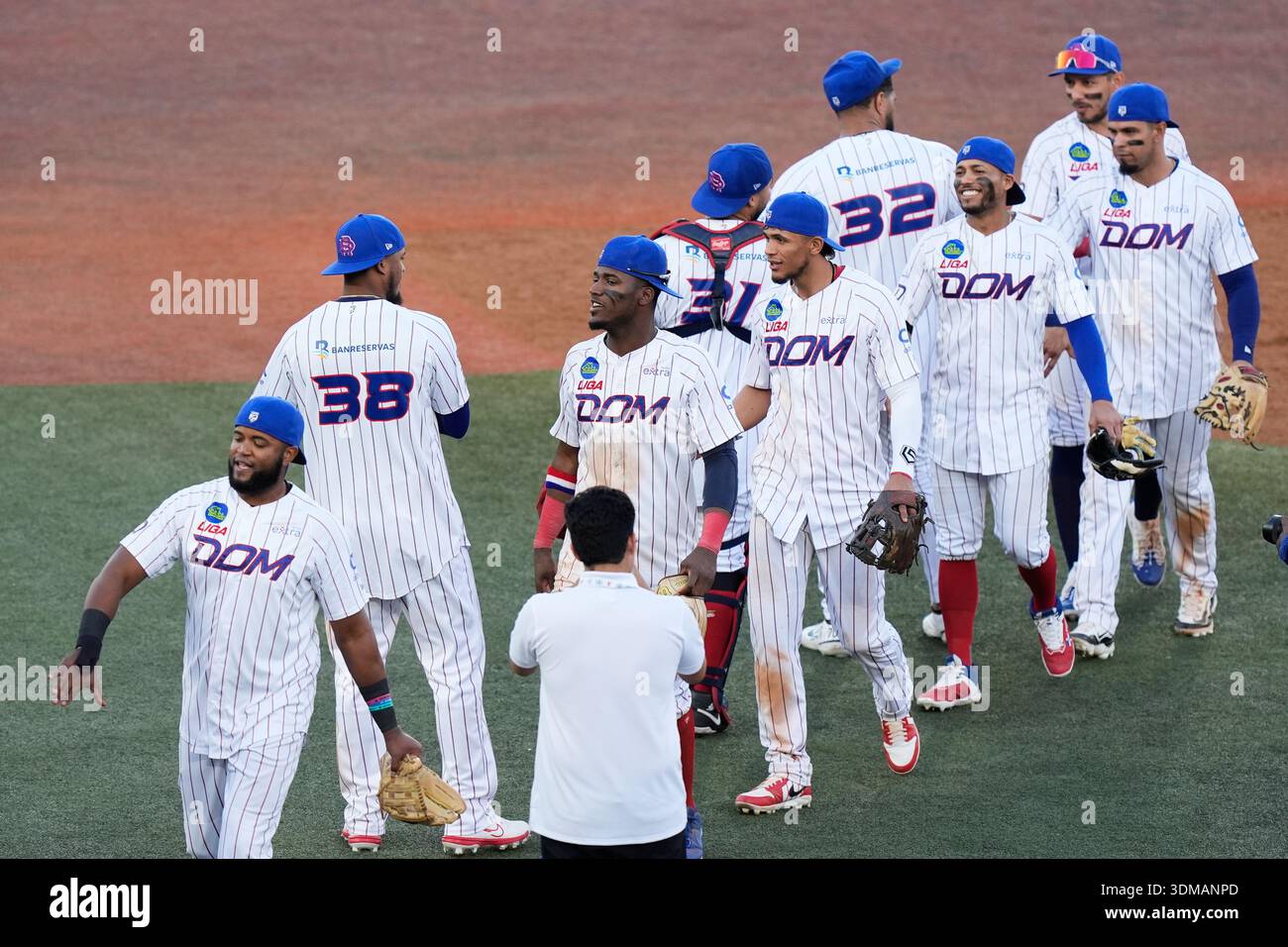Dominican players celebrate after a Caribbean Series baseball game ...