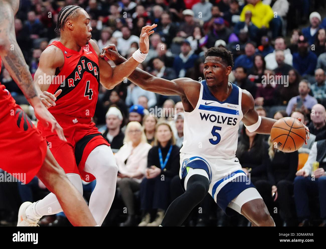 Minnesota Timberwolves' Anthony Edwards (5) protects the ball from ...
