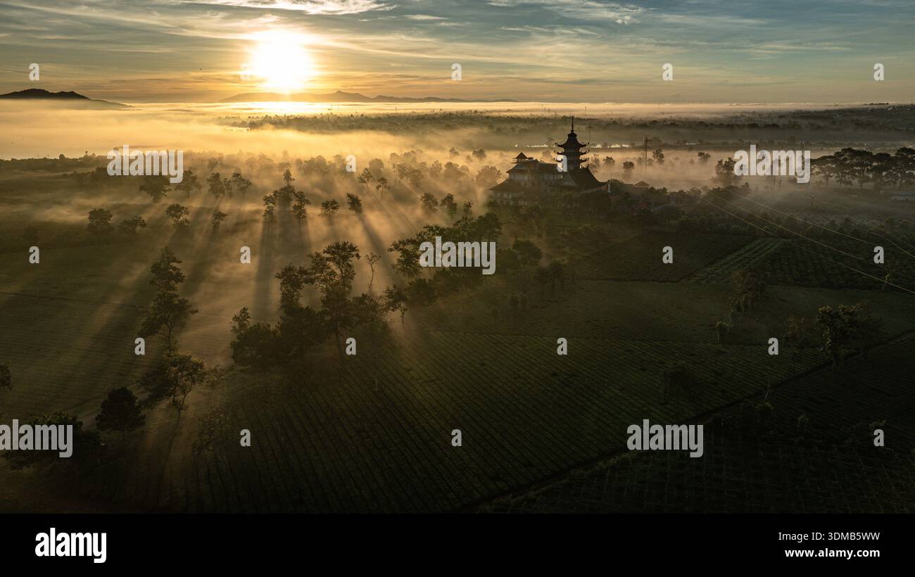 The sun rises and the mist disappears, wonderful morning landscape in ...