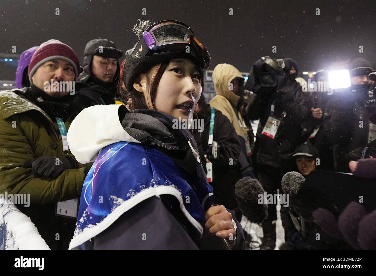 Japanese snowboarder Kokomo Murase (front) meets the press after a ...