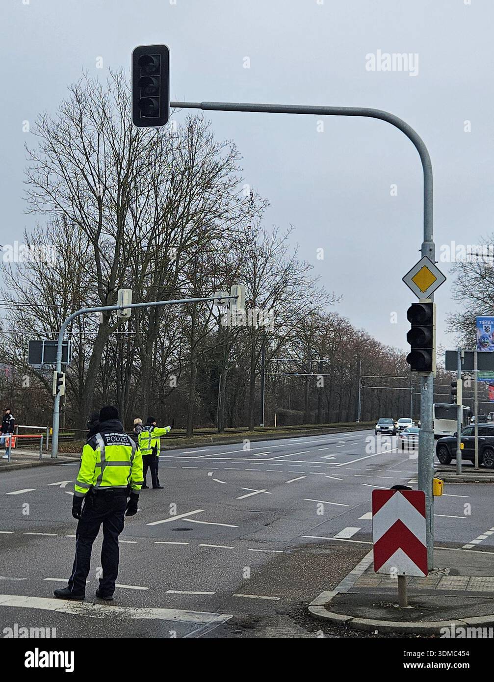 05 February 2026, Baden-Württemberg, Stuttgart: Police officers direct ...