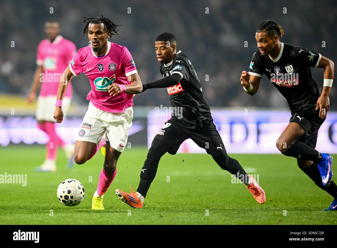 Yann Gboho of Toulouse Football Club and Rayan Lutin of Amiens during ...