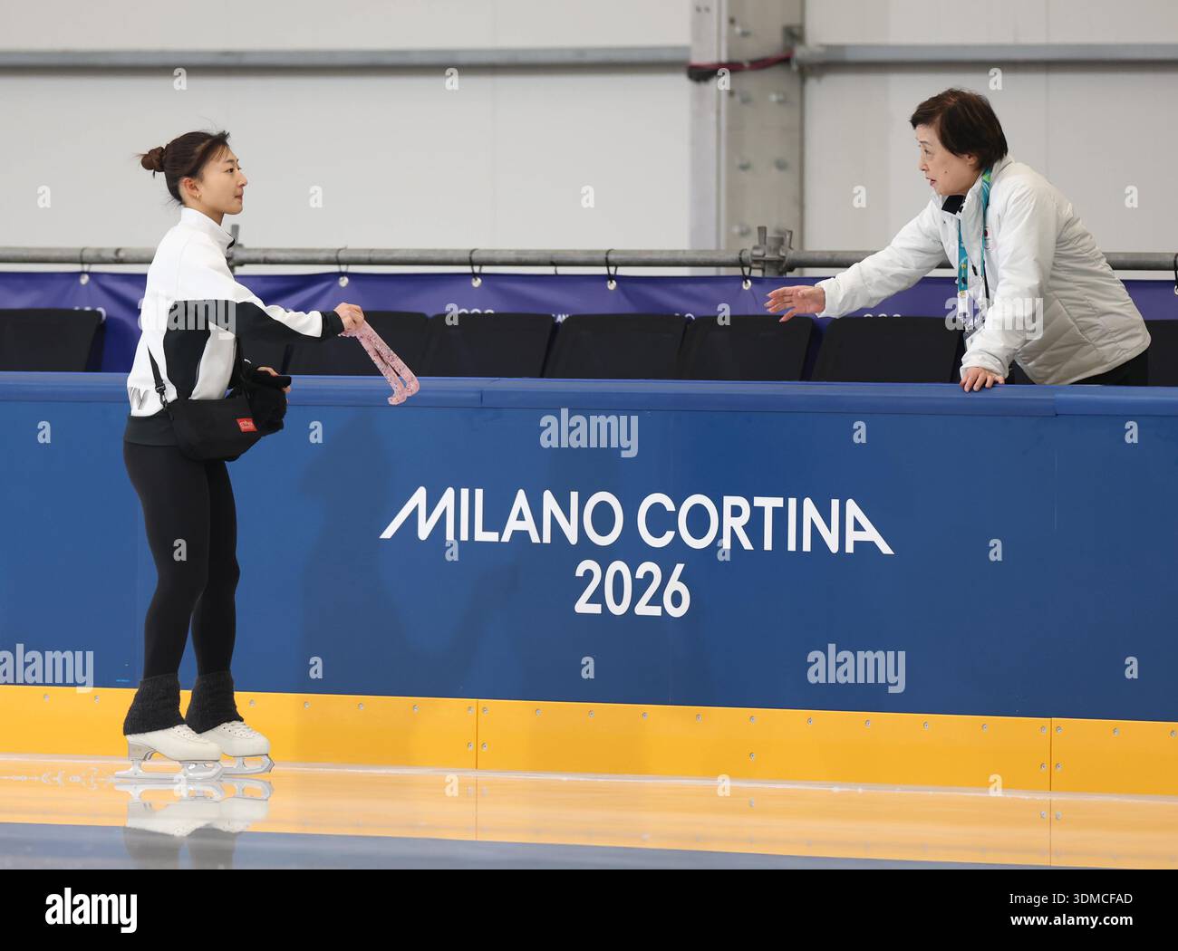 Kaori Sakamoto of Japan (left) and coach Sonoko Nakano take part in an ...