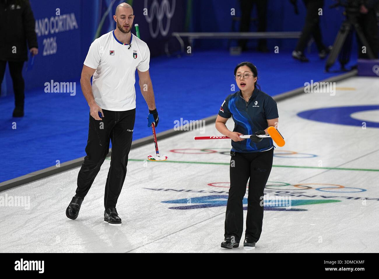South Korea's Kim Seon-yeong and Italy's Amos Mosaner in action during ...
