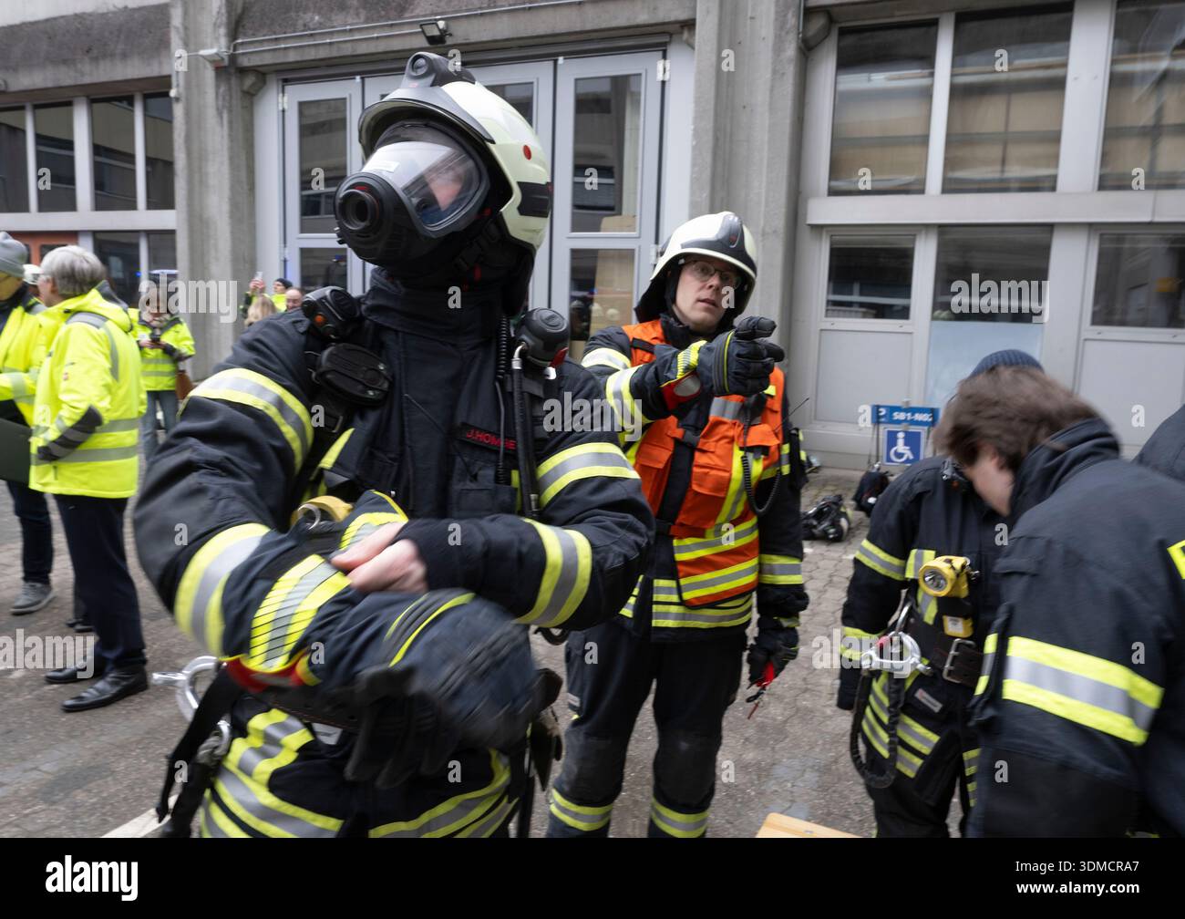 05 February 2026, Hesse, Darmstadt-Wixhausen: Firefighters fight a fire ...