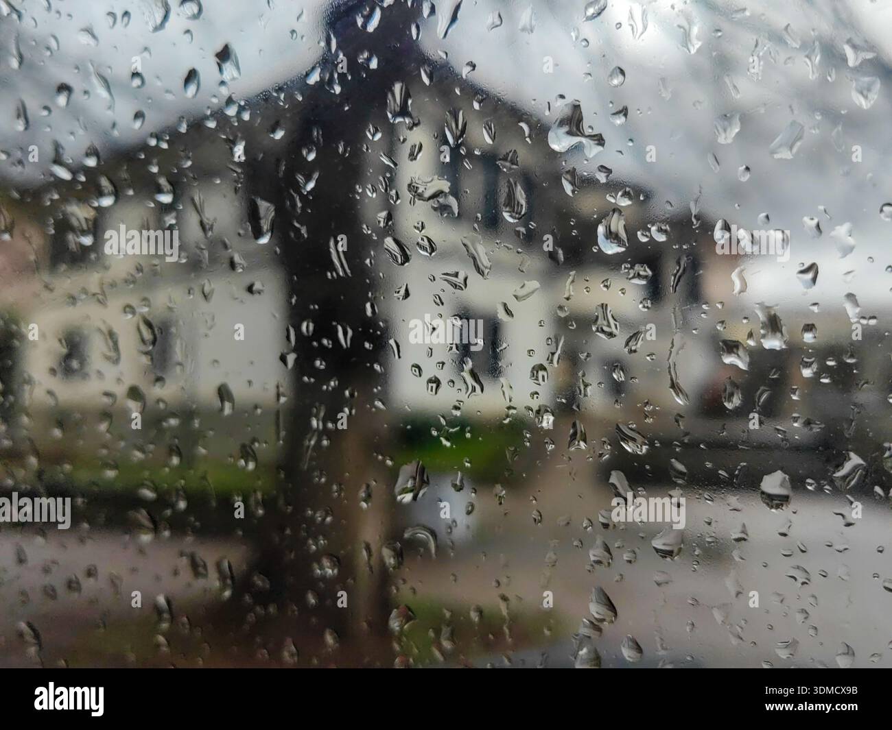 Rain Veil. Blurry background, architecture Stock Photo - Alamy