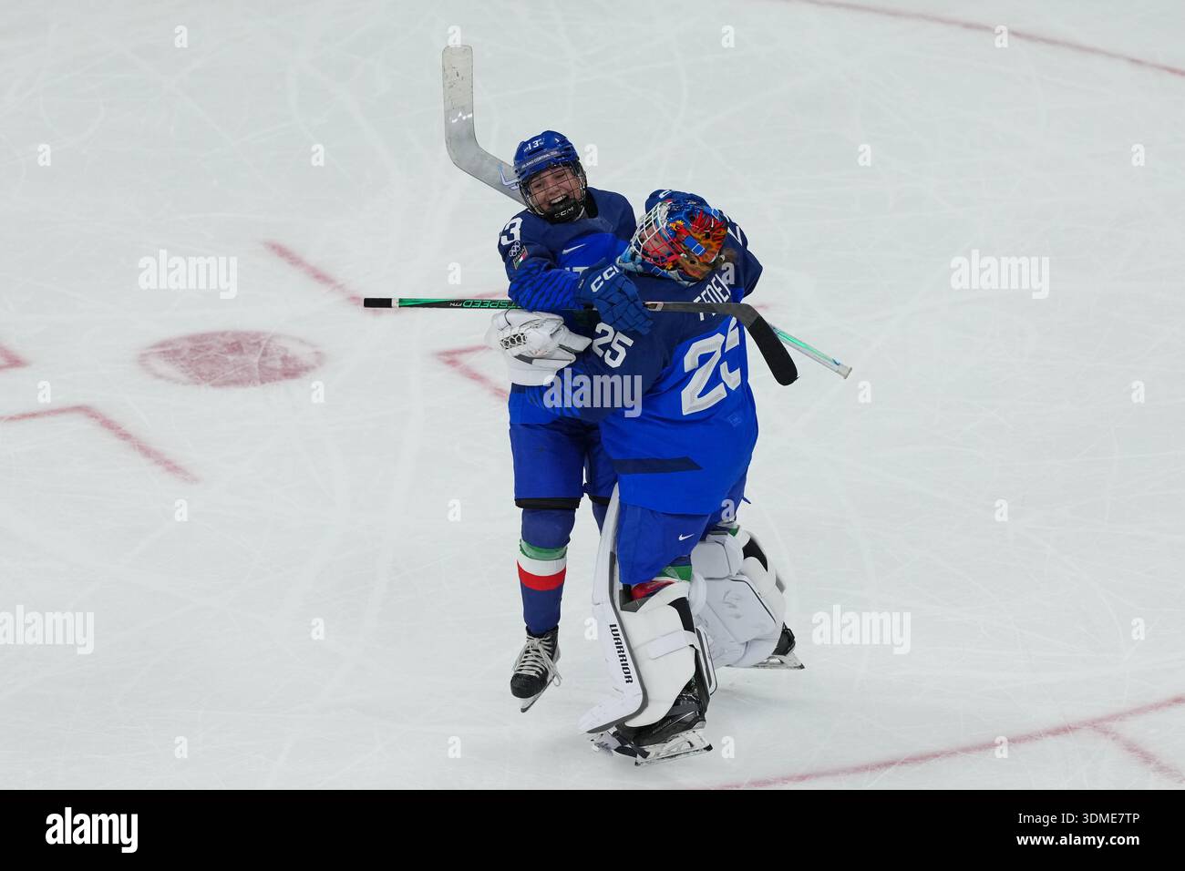 Italy's Laura Lobis (13) and Martina Fedel (25) celebrate after winning ...