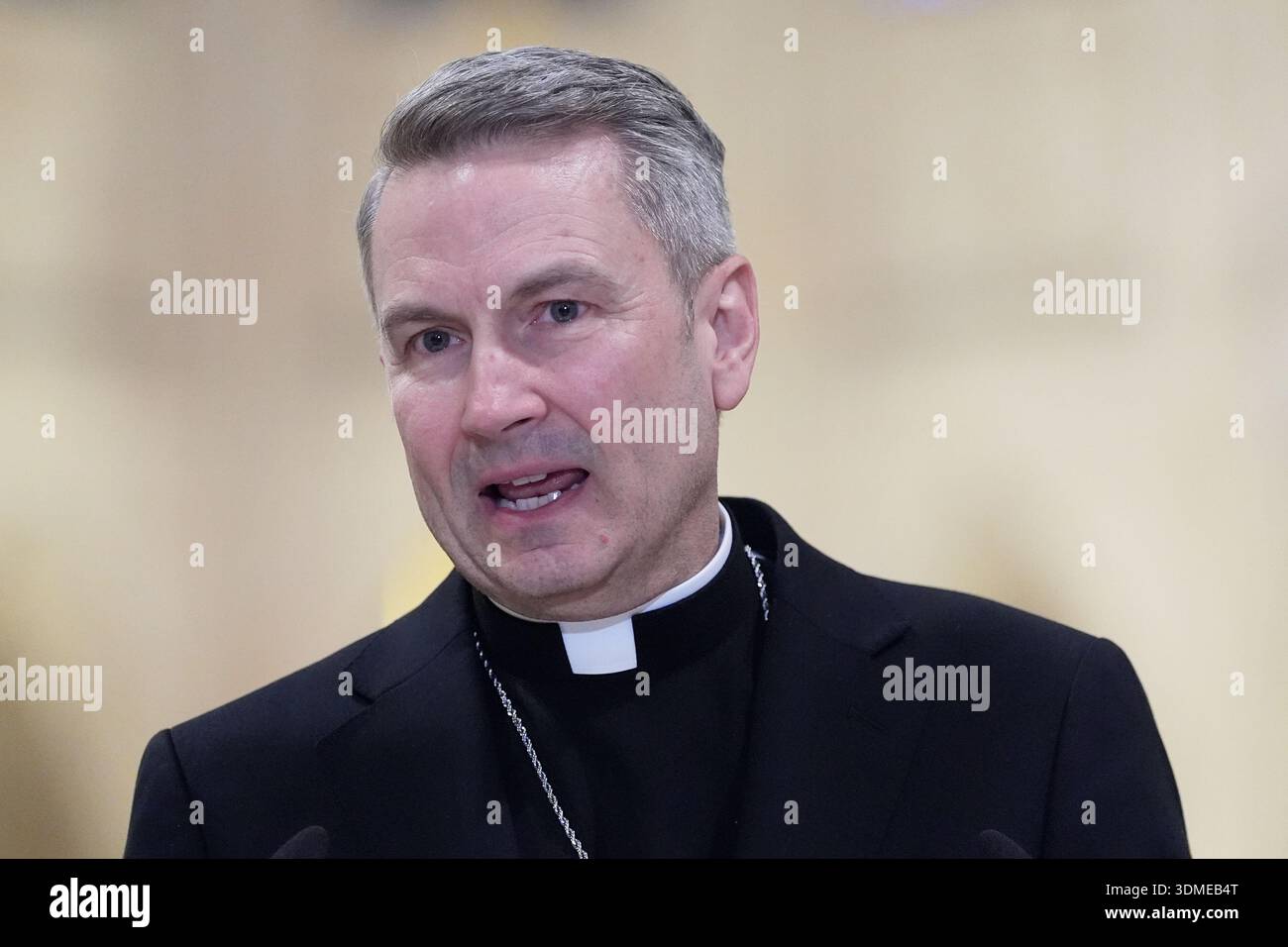 Archbishop-designate Ronald Hicks talks to reporters during a news ...
