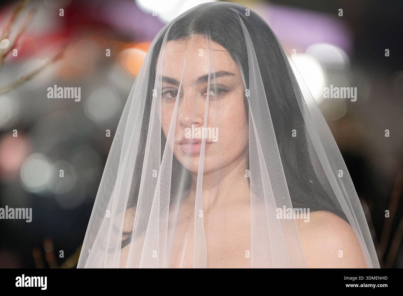Charli xcx poses for photographers upon arrival at the premiere of the ...