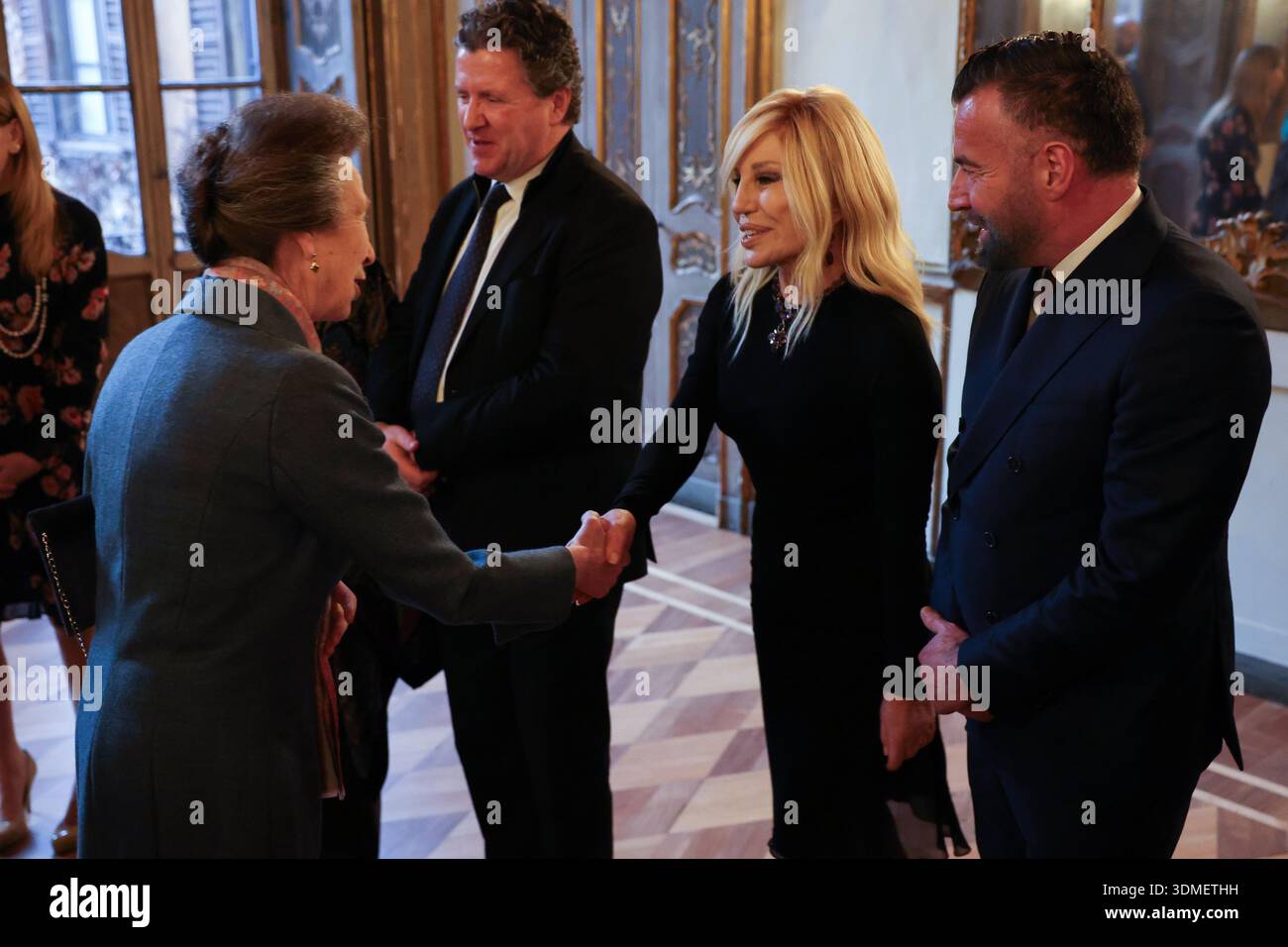 Britain's Princess Anne, a former Olympic equestrian, shakes hands with ...