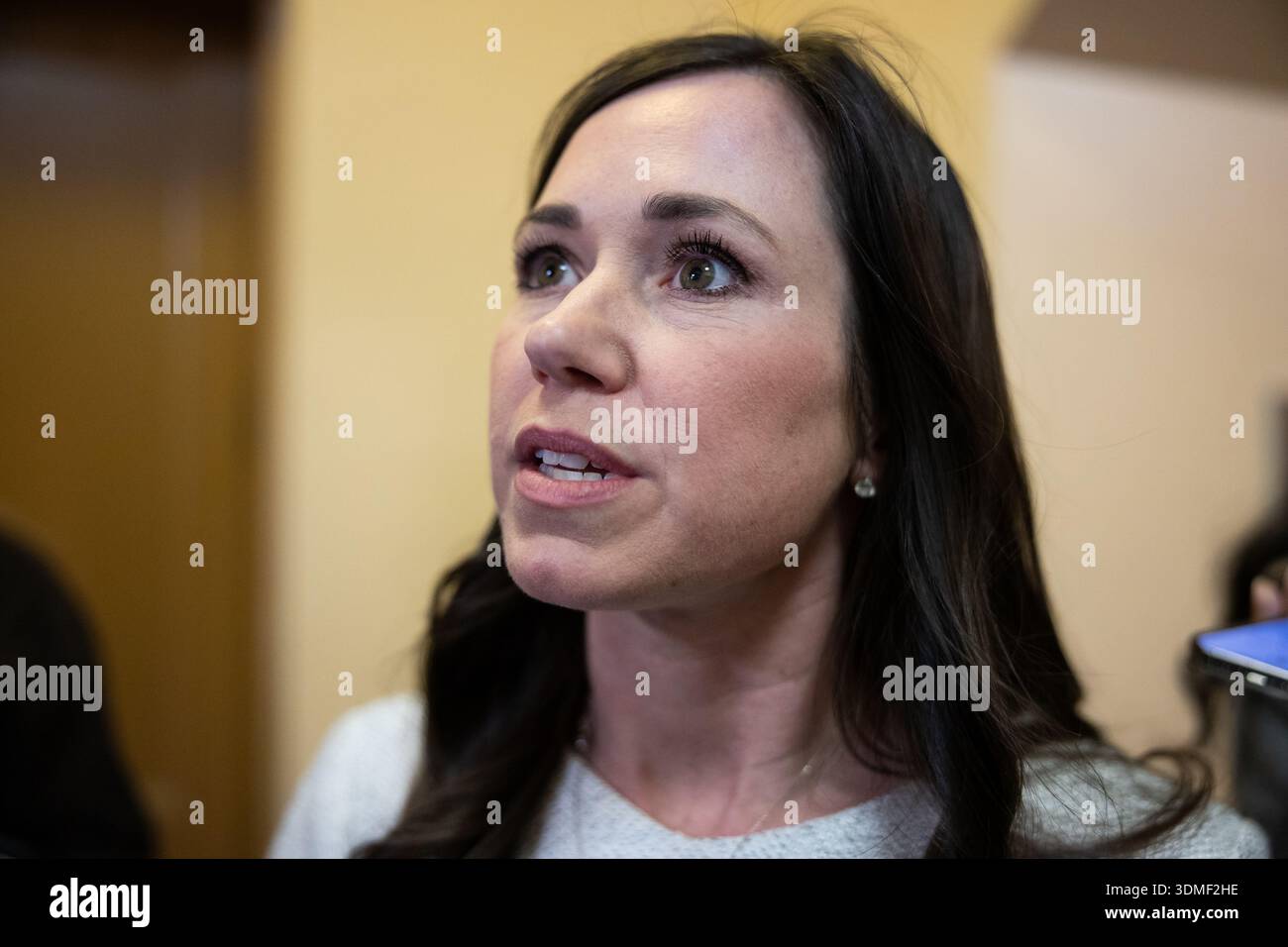Sen. Katie Britt (R-Ala.) speaks with reporters as she walks to a vote ...