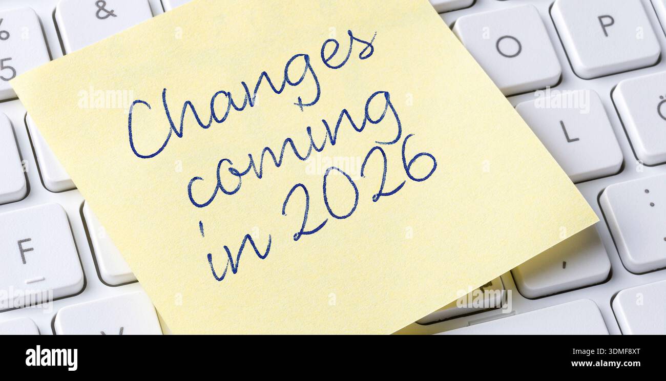 Sticky note on a keyboard - Changes coming in 2026 Stock Photo - Alamy