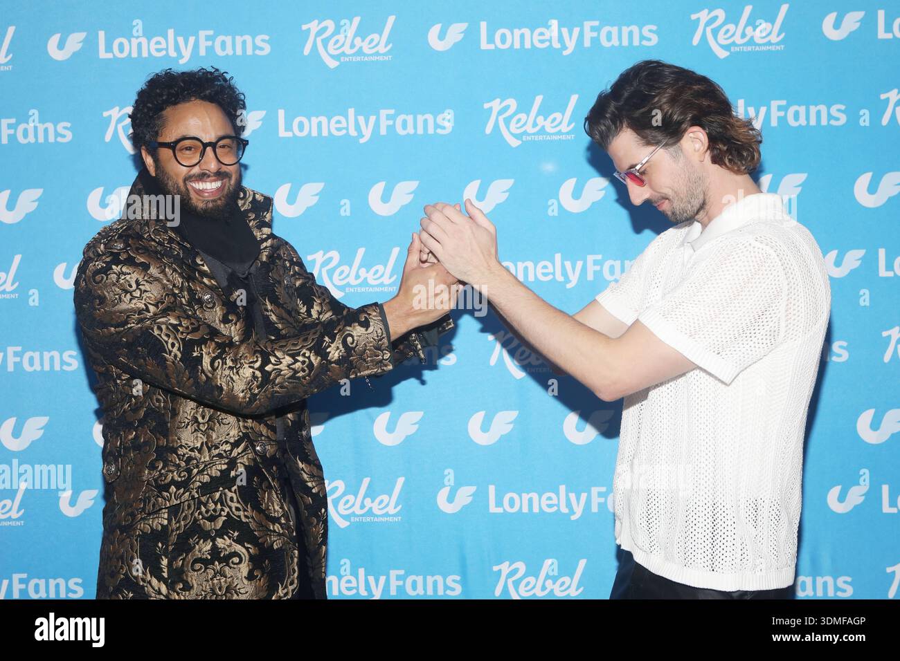 Rock Jacobs and K.C. Wolf attend the New York screening of Lonely Fans ...