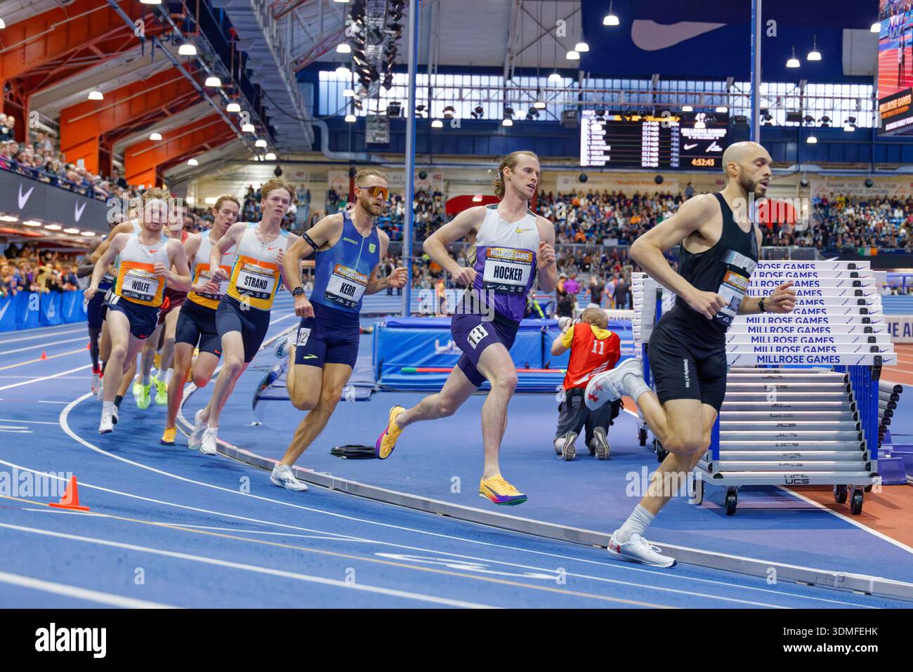 Cole Hocker (USA), Josh Kerr (GBR), and Ethan Strand (USA) behind pace ...
