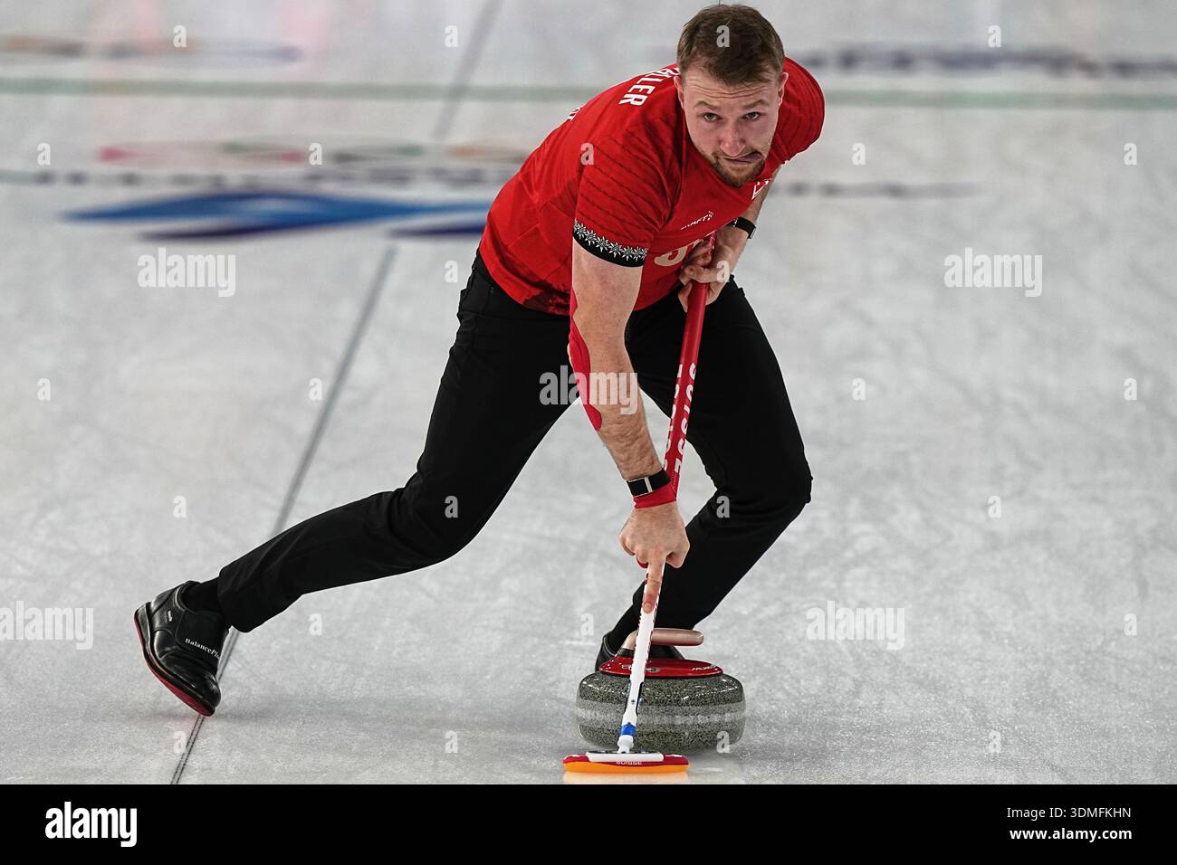 Switzerland's Yannick Schwaller in action during the mixed doubles ...