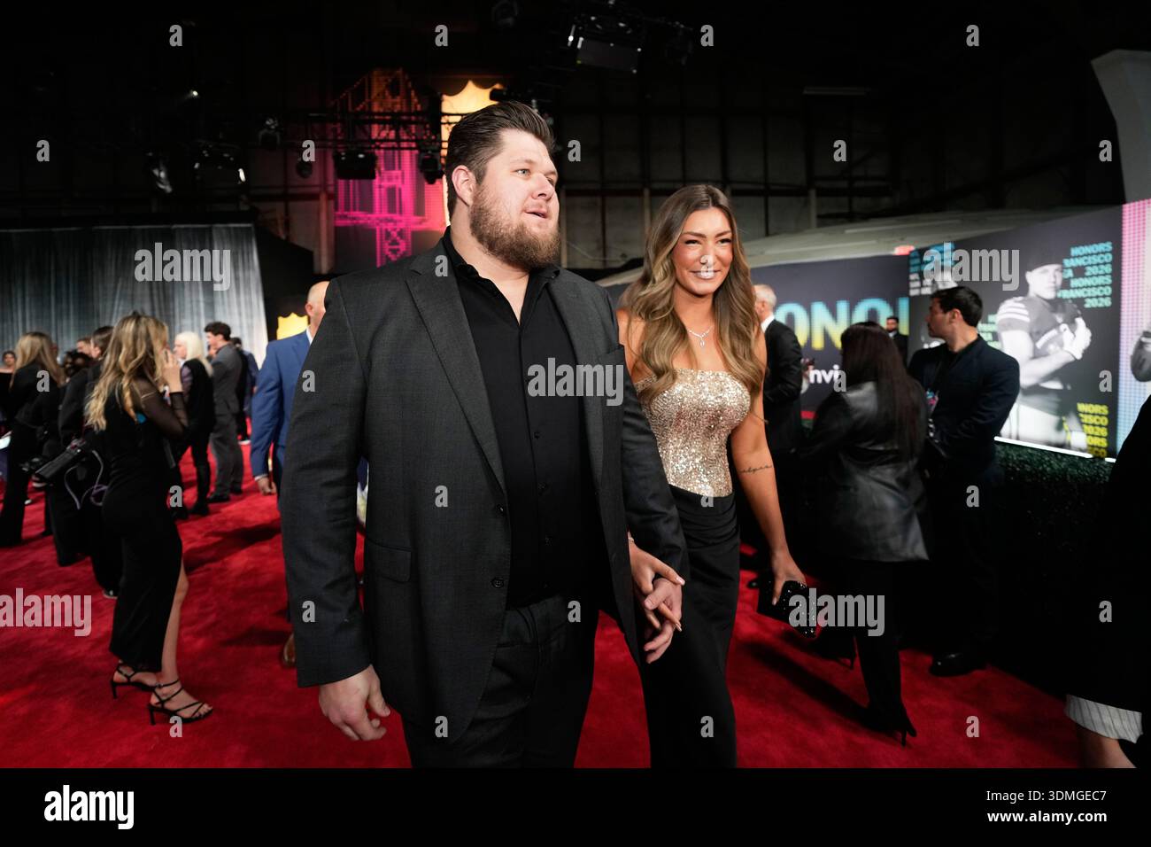 Kansas City Chiefs' Creed Humphrey, left, and Ana Demmer arrive before ...