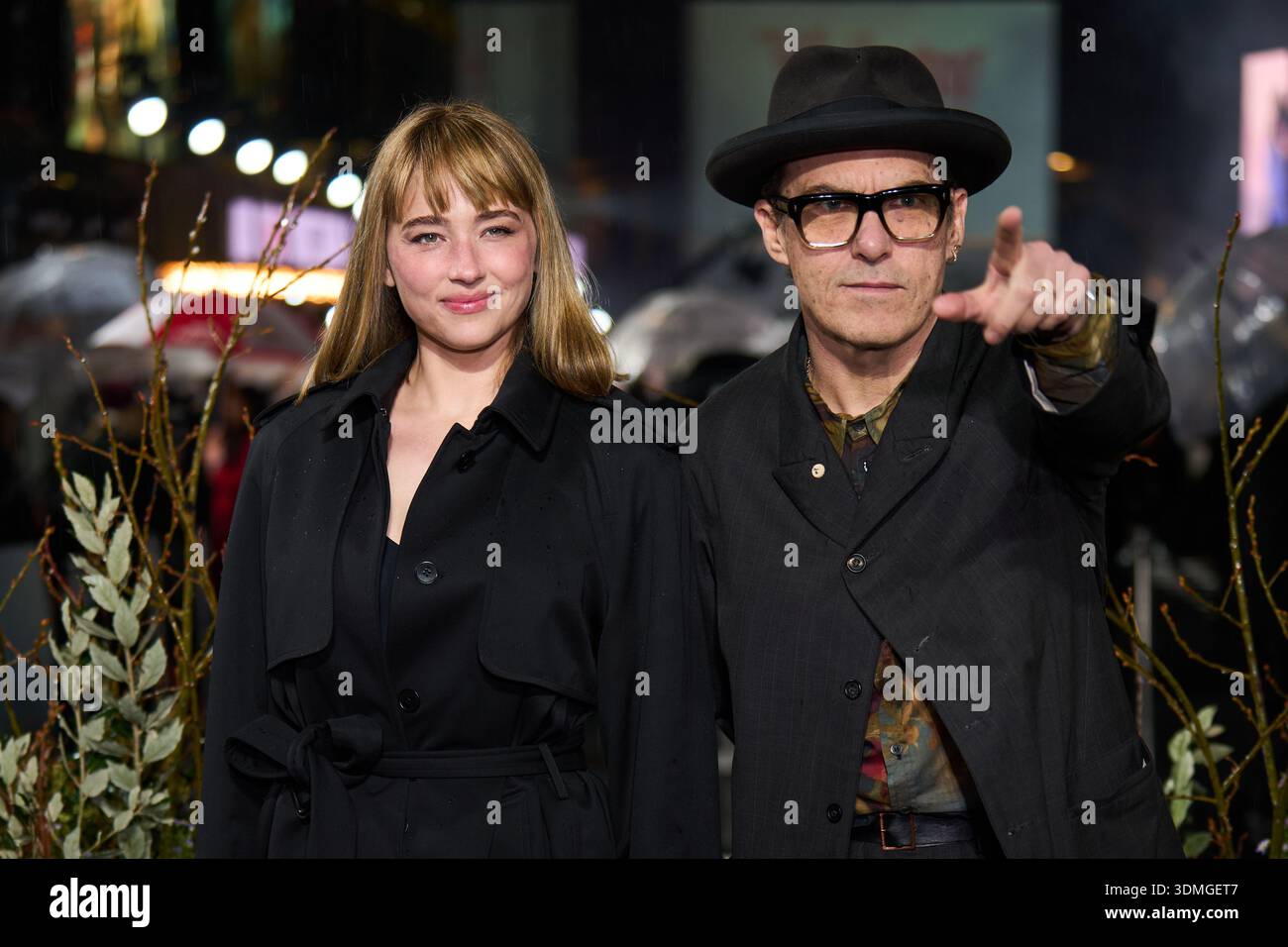Haley Bennett, left, and Joe Wright pose for photographers upon arrival ...