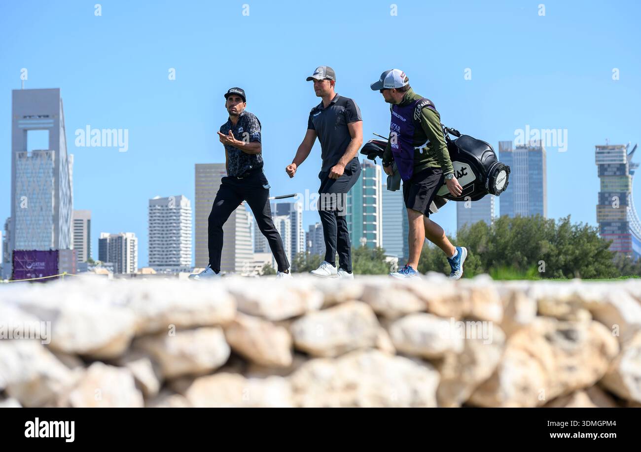 Rafa Cabrera Bello (L) of Spain and Niklas Norgaard of Denmark walk ...