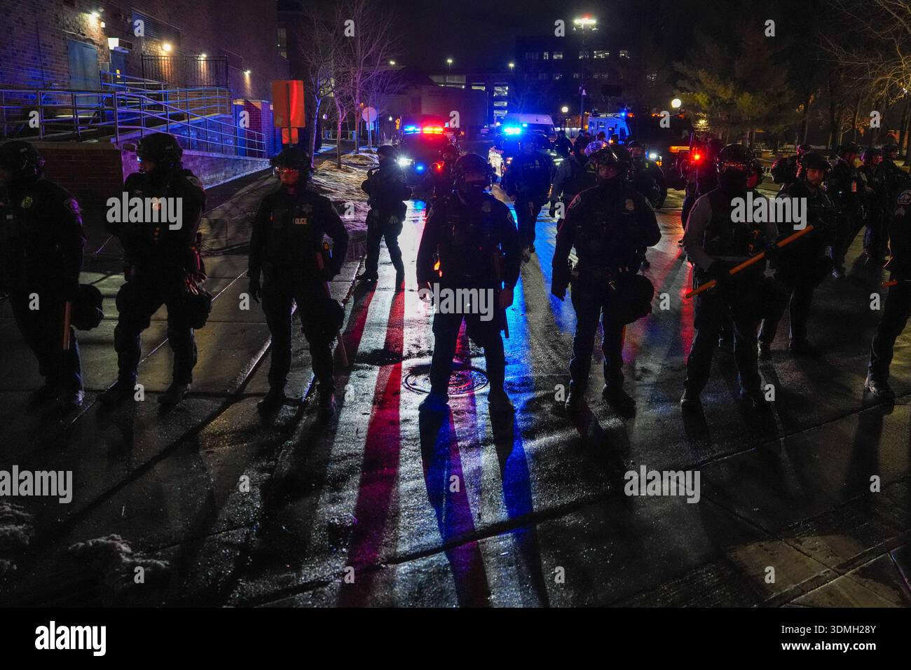 Minneapolis Police officers stand guard during a noise demonstration ...