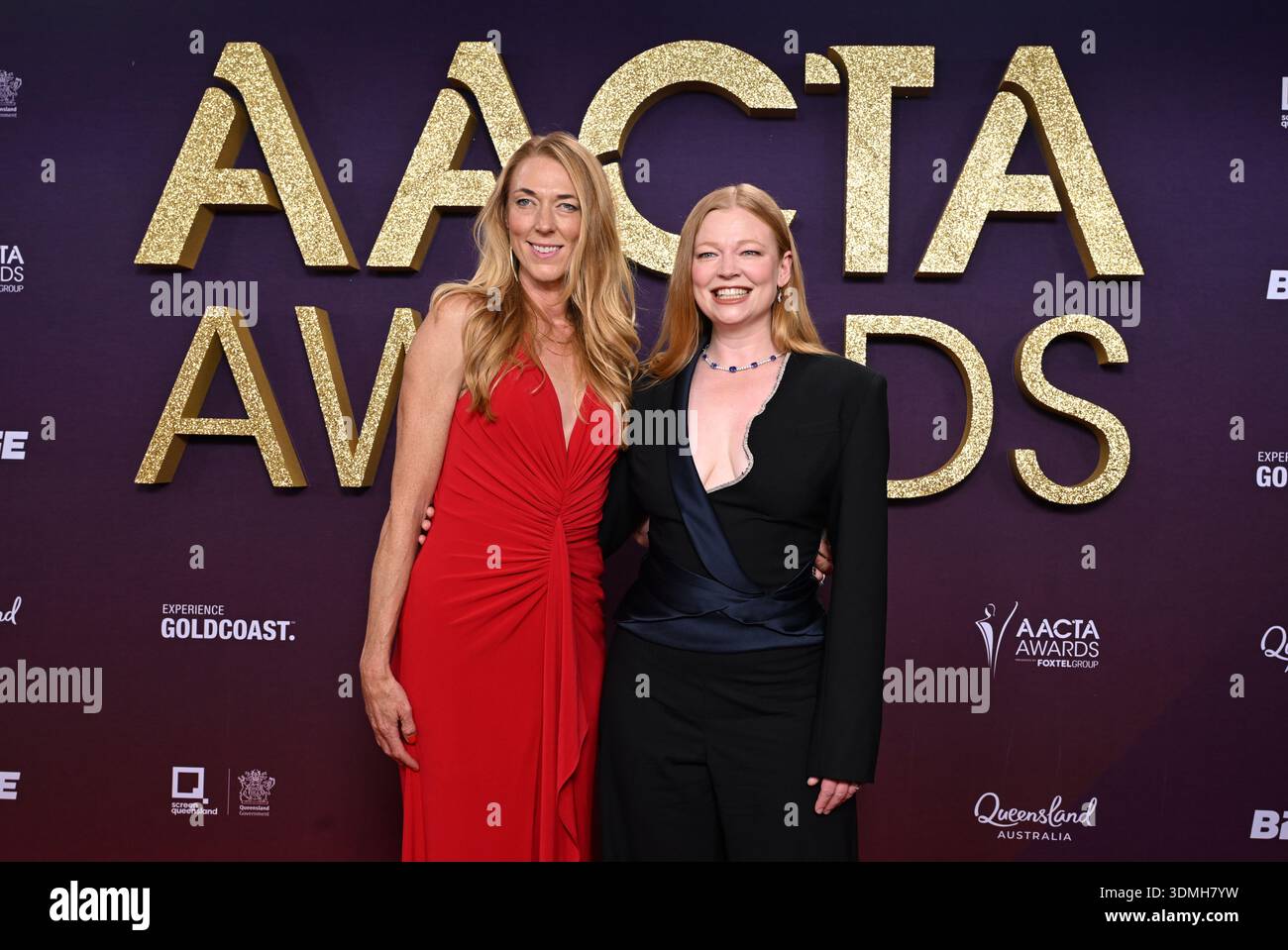 Laura Snook (left) and Sarah Snook (right) are seen posing for a photo ...