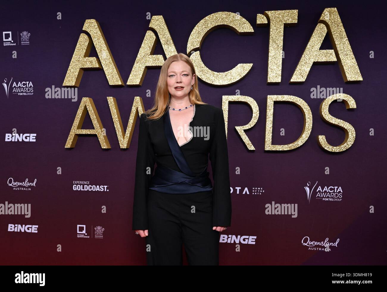 Sarah Snook is seen posing for a photo on the red carpet at the 2024 ...