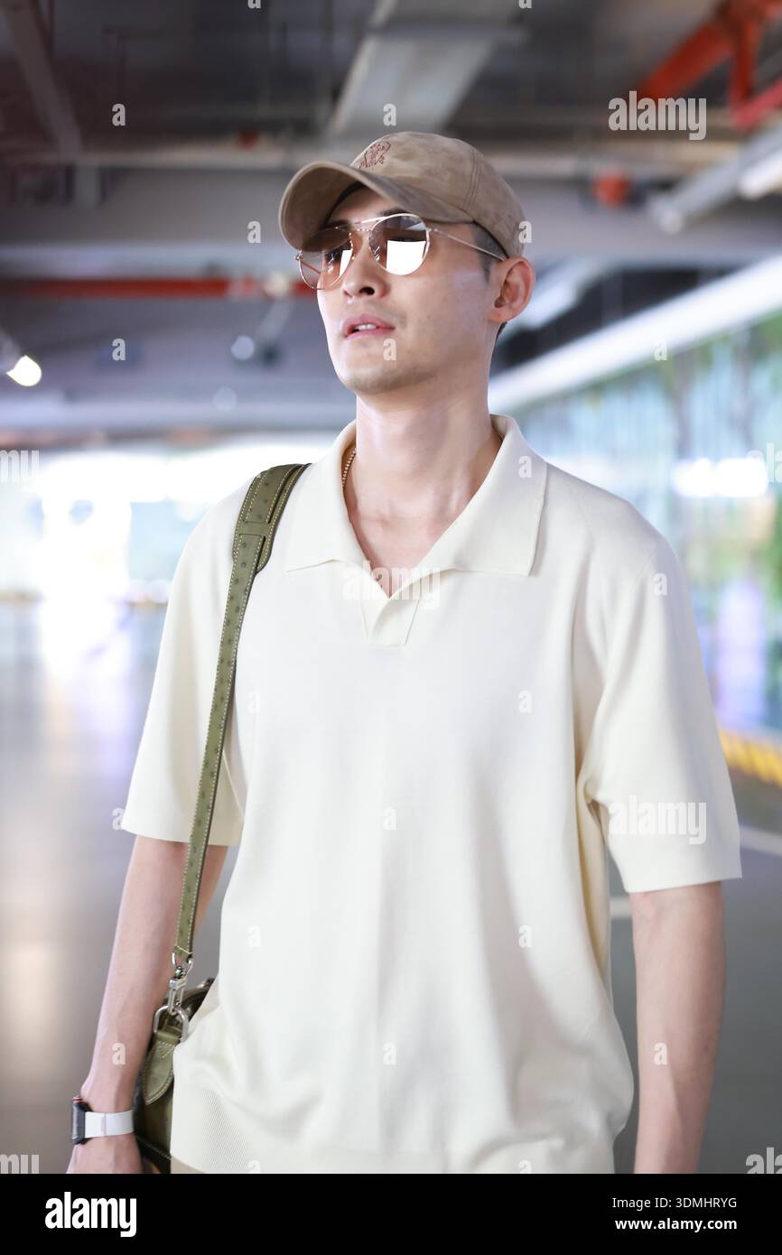 Chinese actor, singer and host Hans Zhang arrives at Beijing airport ...