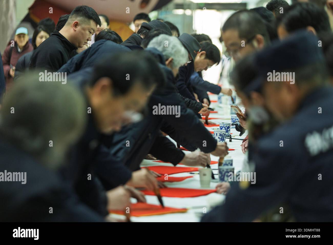 Calligraphers write and gift 'Fu' characters to people, symbolizing New ...