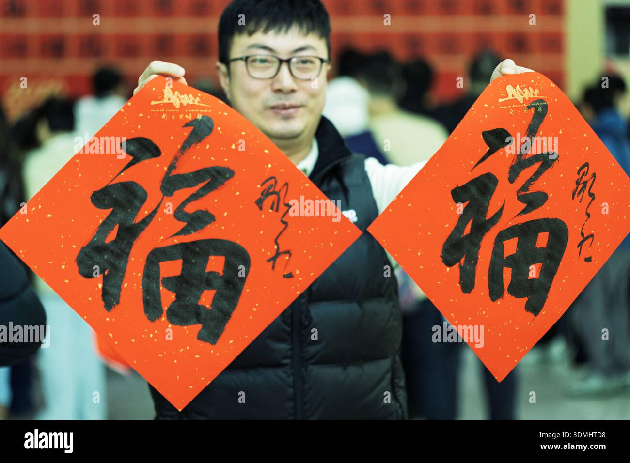 Calligraphers write and gift 'Fu' characters to people, symbolizing New ...