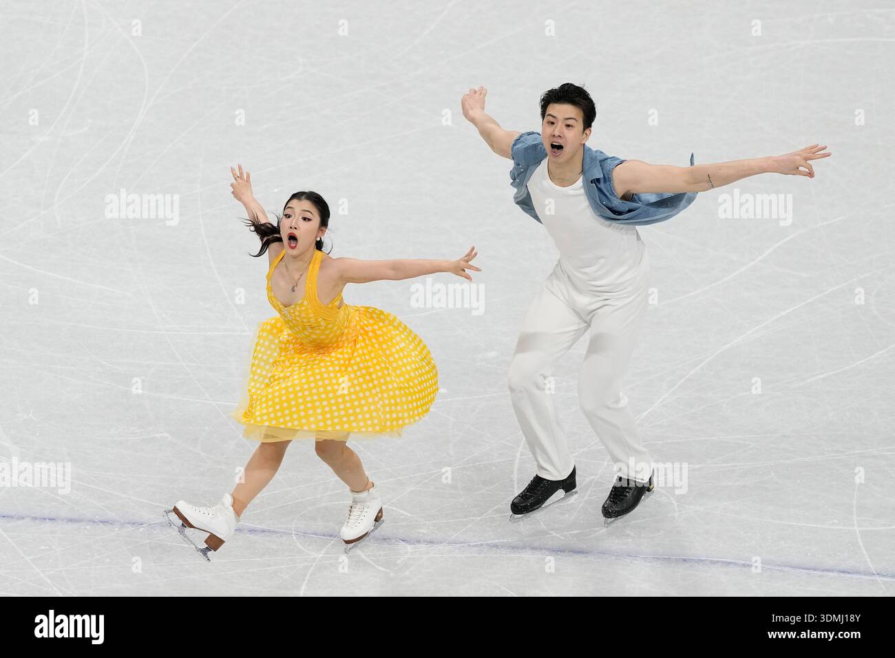 Wang Shiyue and Liu Xinyu of China compete during the figure skating ...