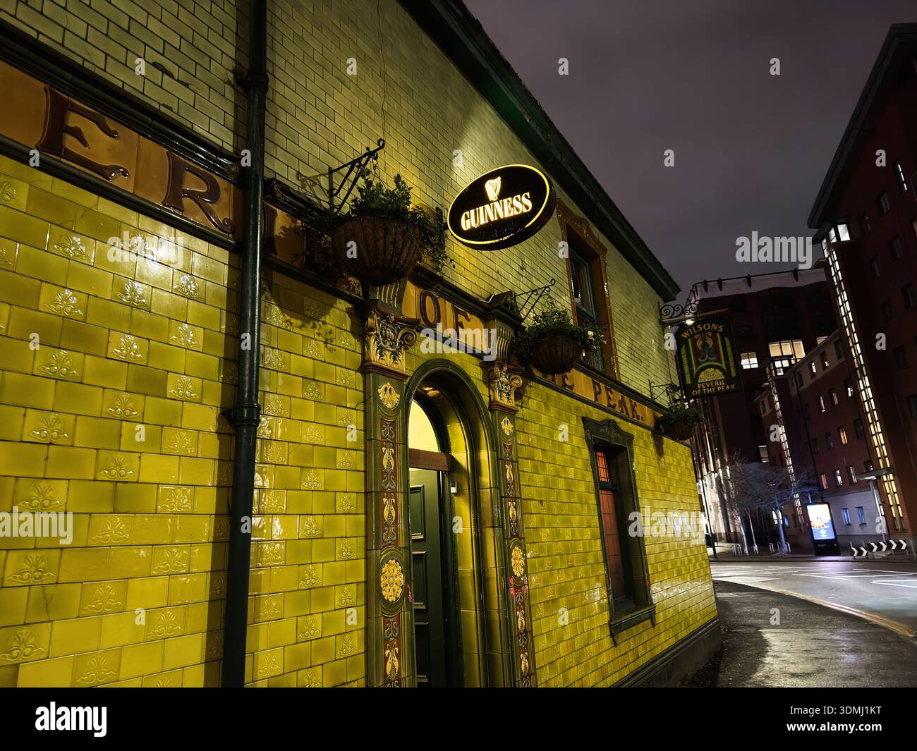 Manchester, UK - January 21, 2026: Warm illuminated Peveril of the Peak ...