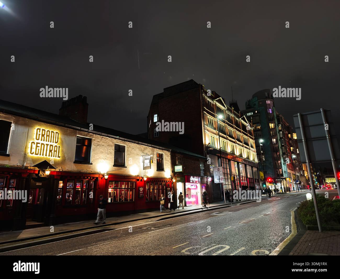Manchester, UK - January 21, 2026: Nighttime city street in Manchester ...