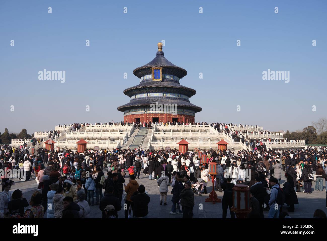 Visitors tour the Temple of Heaven to experience its grand imperial ...
