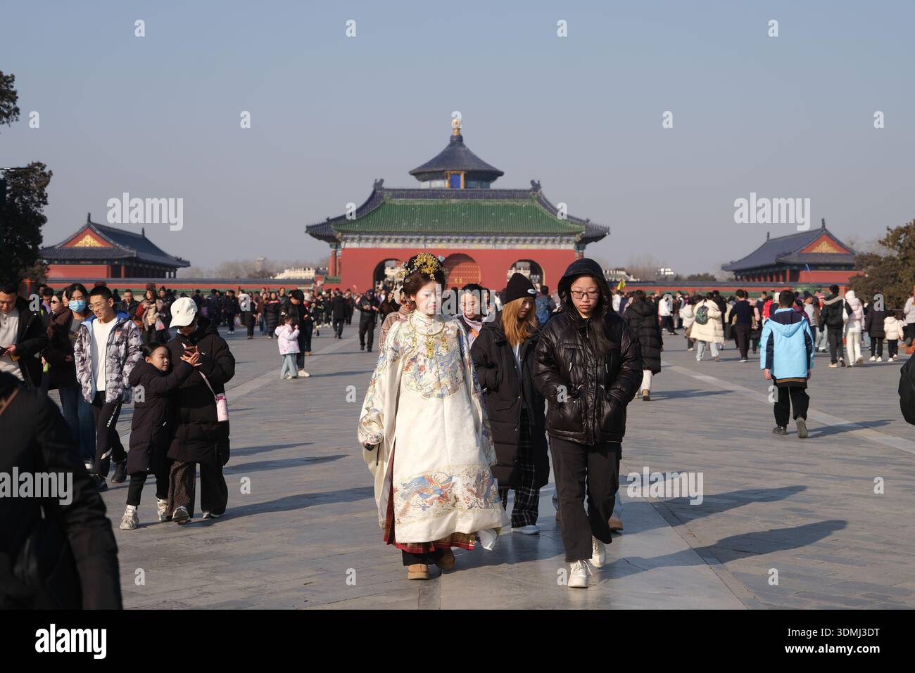 Visitors tour the Temple of Heaven to experience its grand imperial ...