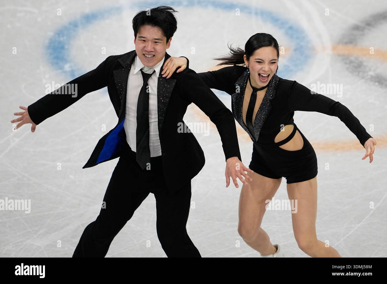 Hannah Lim and Yê Quan of Korea compete during the figure skating ice ...