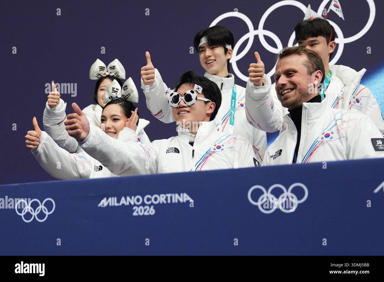 Hannah Lim and Yê Quan of Korea wait for their scores after competing ...
