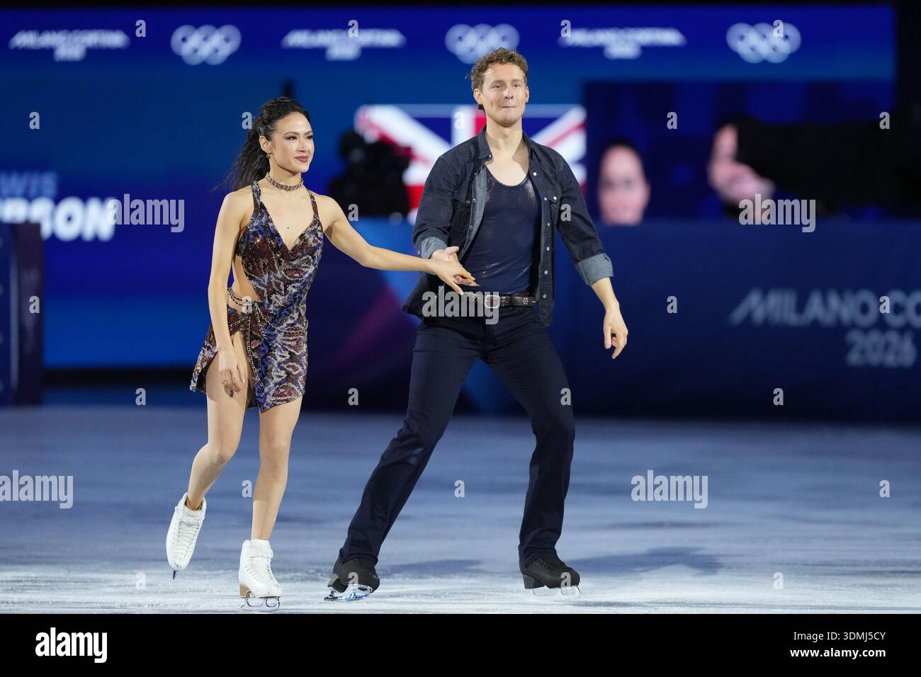 Madison Chock and Evan Bates of the United States are introduced before ...