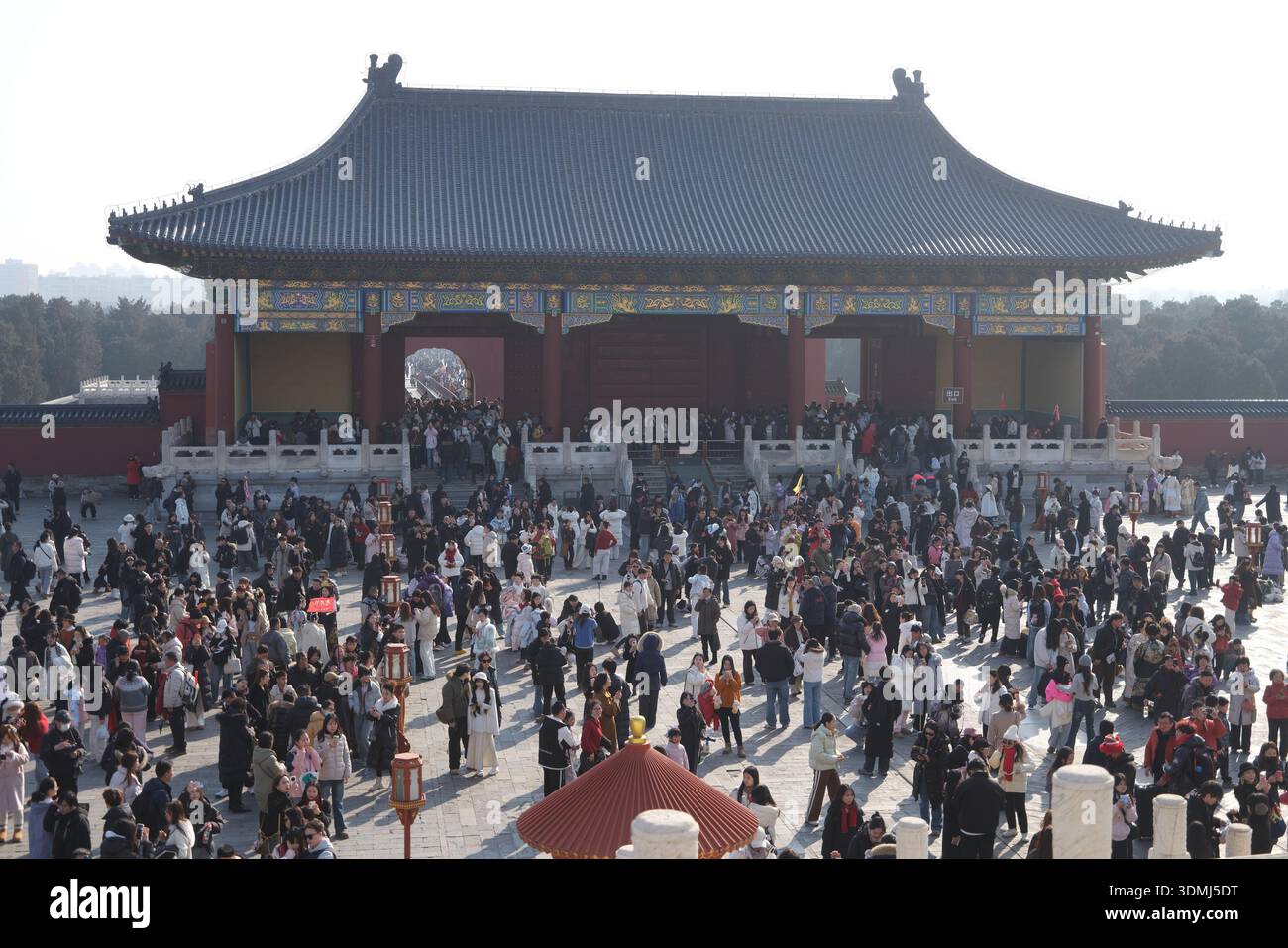 Visitors tour the Temple of Heaven to experience its grand imperial ...