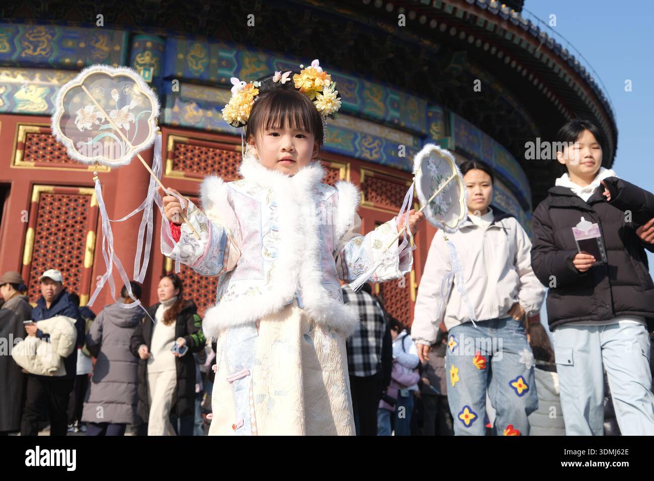 Visitors tour the Temple of Heaven to experience its grand imperial ...