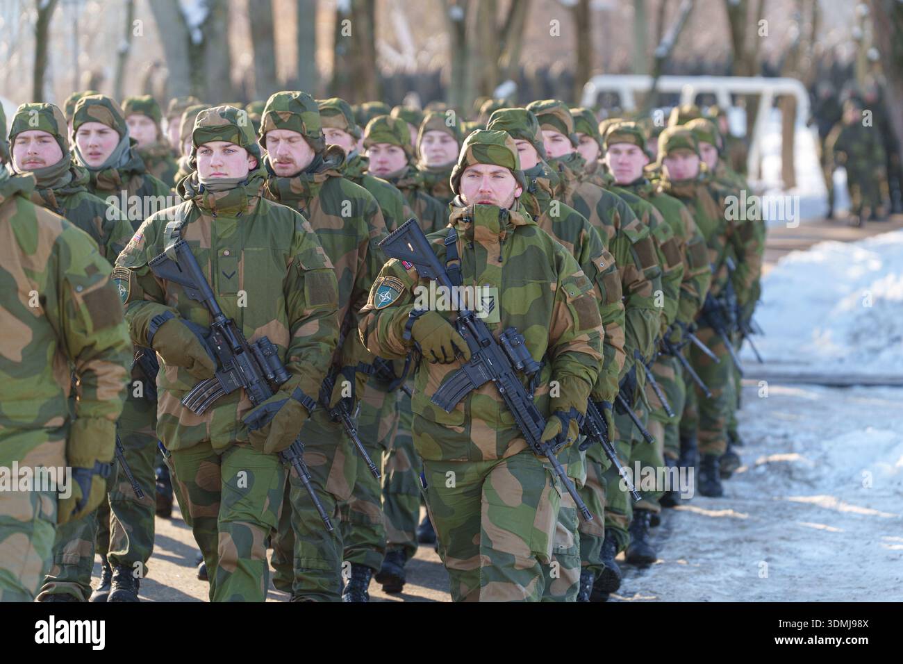 Soldiers marching armed assault rifles hi-res stock photography and ...