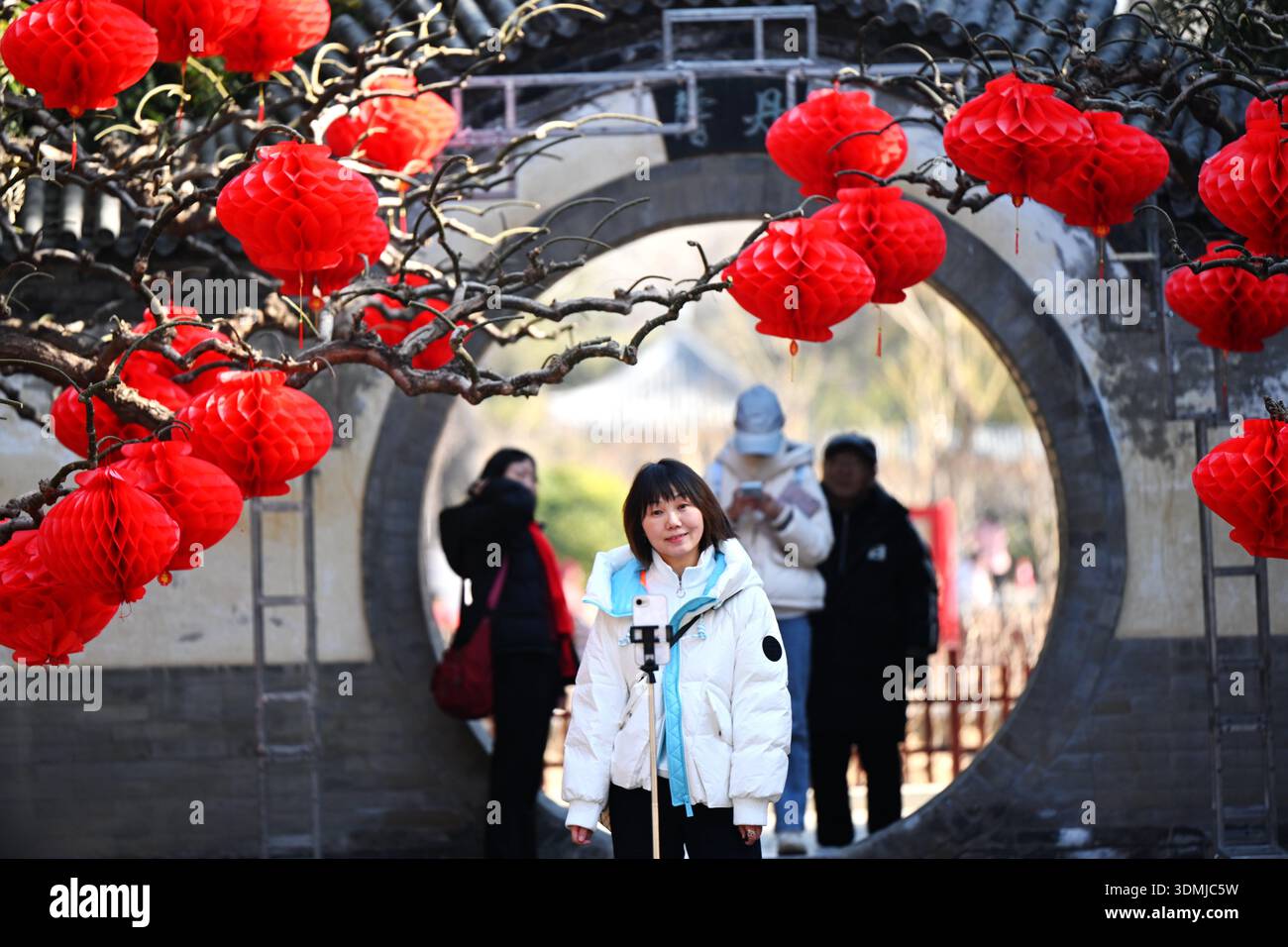 Visitors tour Ditan Park in Beijing, China, 4 February, 2026. (Photo by ...