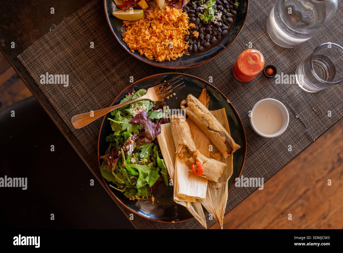 Overhead view of tamale and side dishes in Mexican restaurant Stock ...