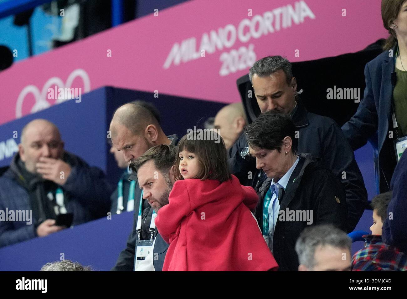 Vice President JD Vance carries his daughter while attending the figure ...